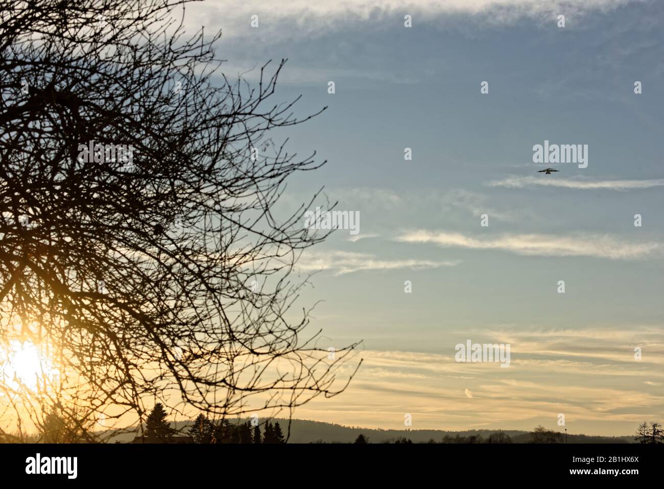 Airplane flying in Sky Stock Photo - Alamy