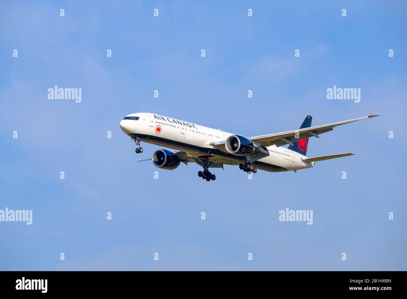 Air Canada airlines airplane preparing for landing at day time in ...