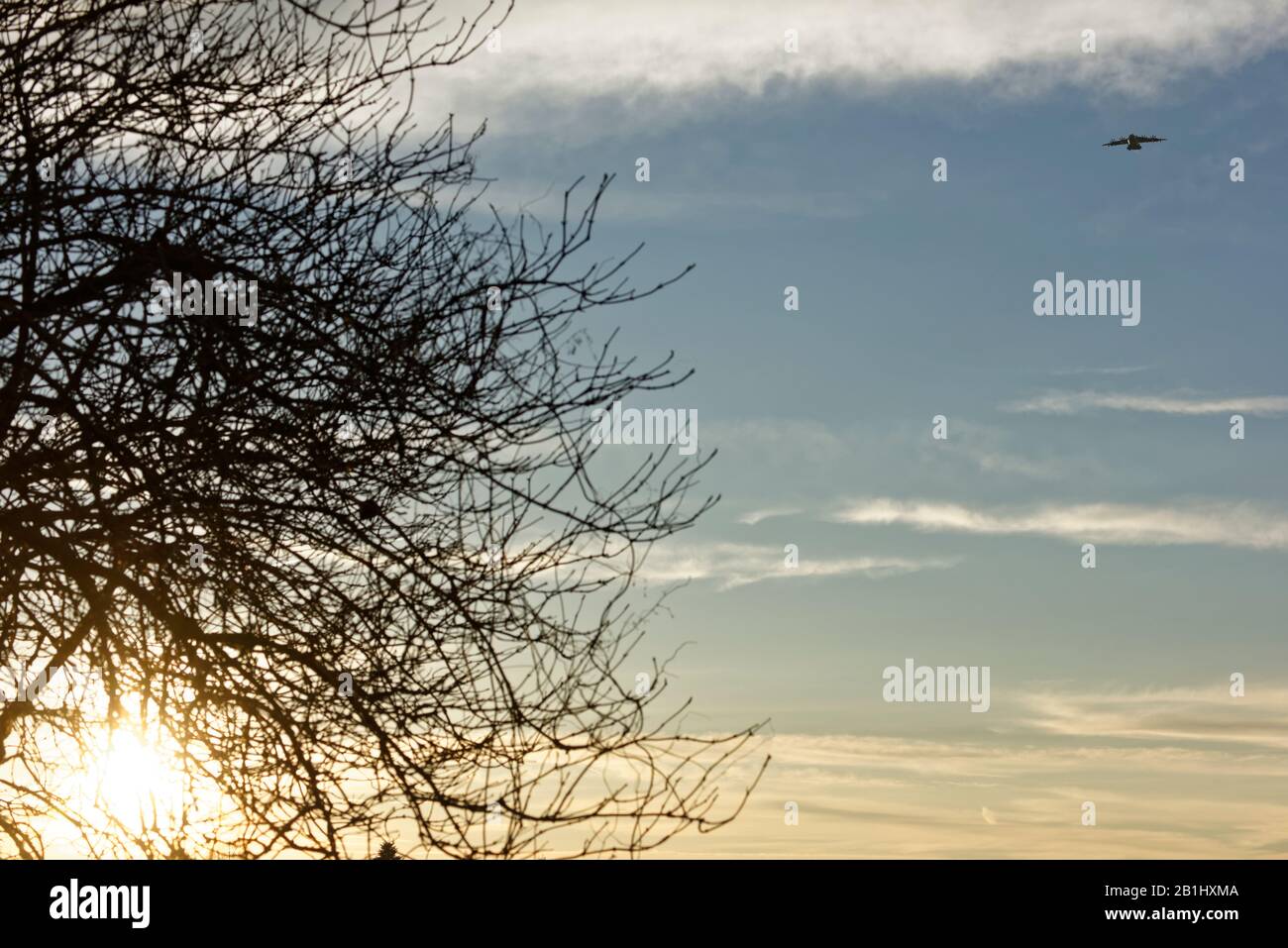 Airplane flying in Sky Stock Photo - Alamy