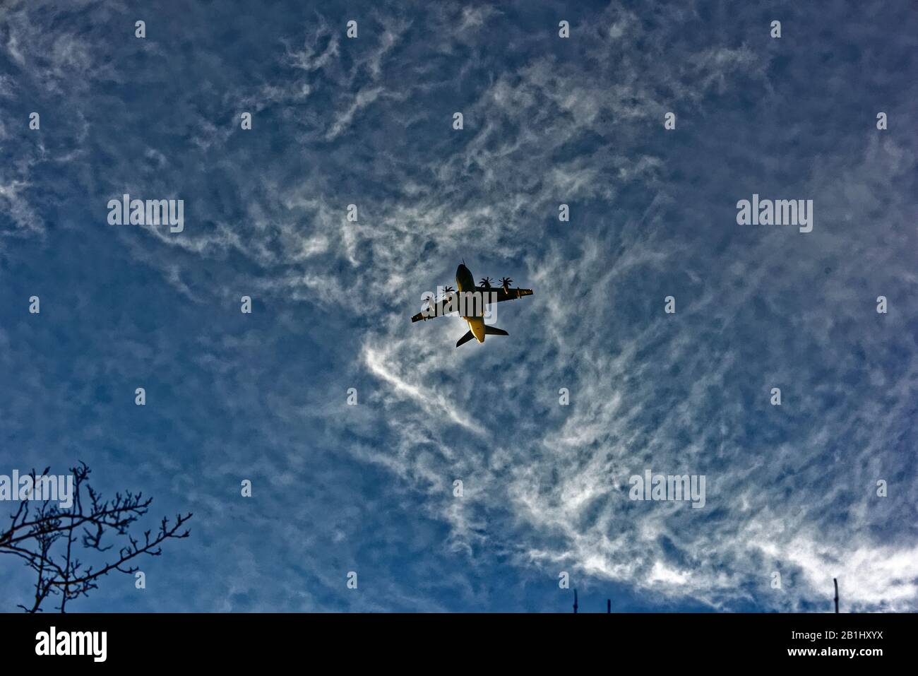Airplane flying in Sky Stock Photo - Alamy