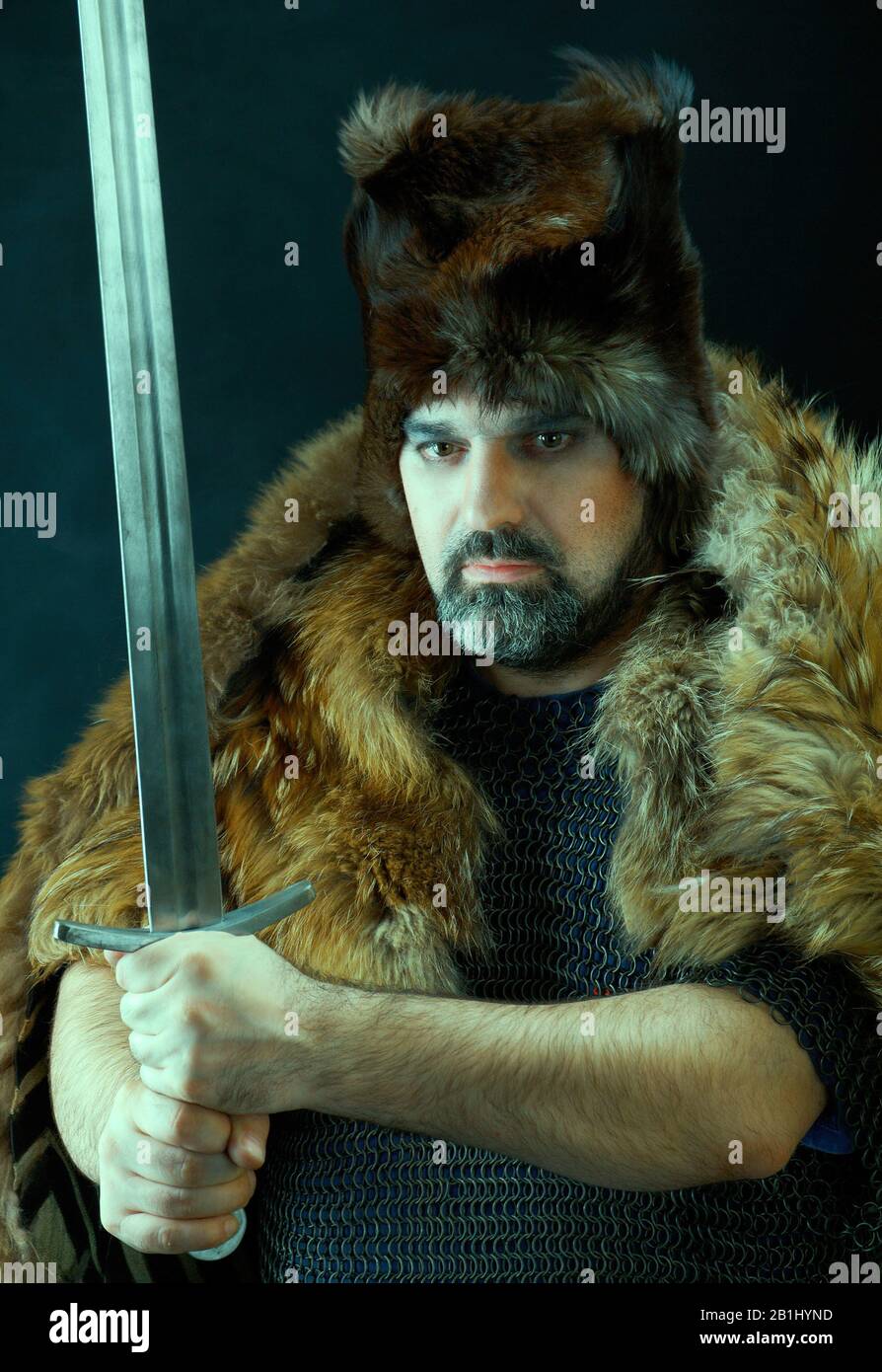 Cimmerian.barbarian Warrior.Medieval knight in the armor with the sword ...