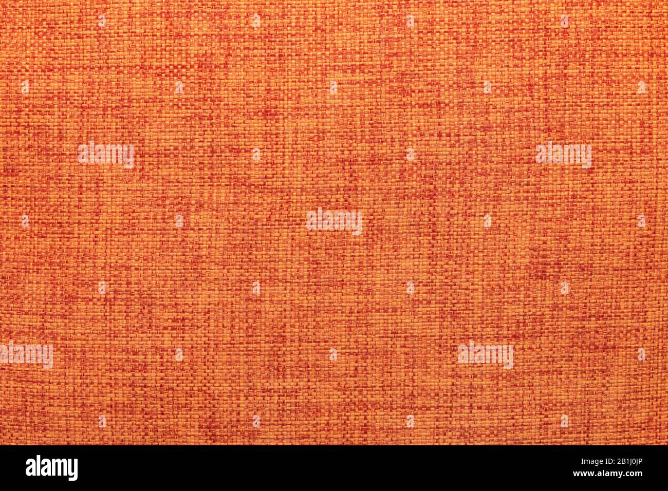Flat lay closeup orange grid fabric. Abstract trendy modern texture ...