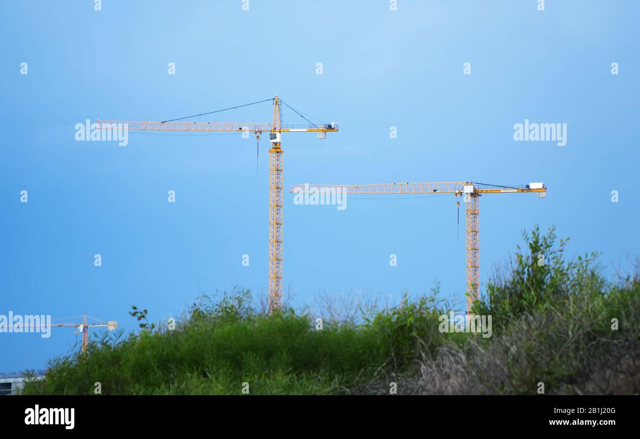 Construction work cranes near hi-res stock photography and images - Alamy
