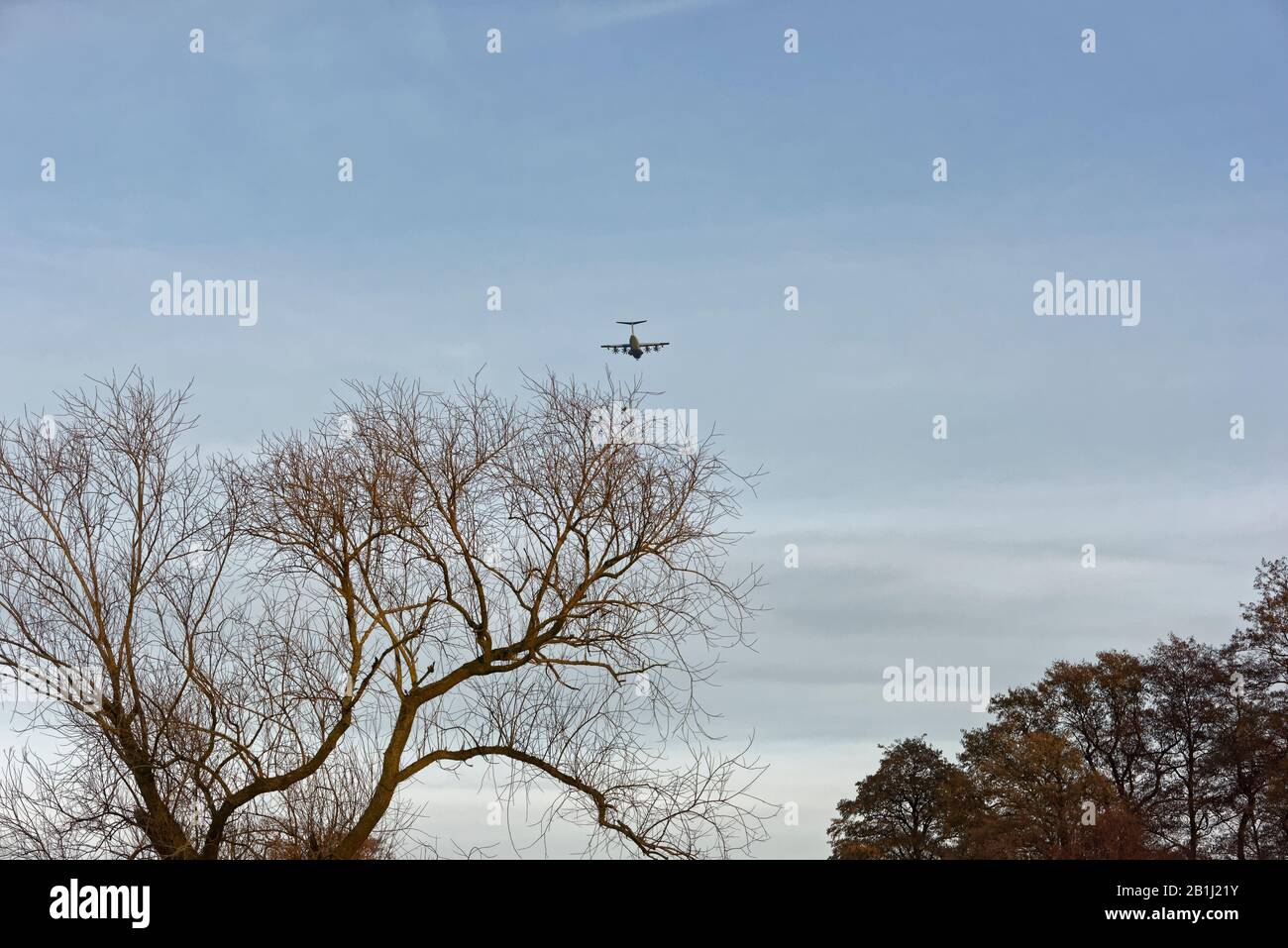 Airplane flying in Sky Stock Photo - Alamy