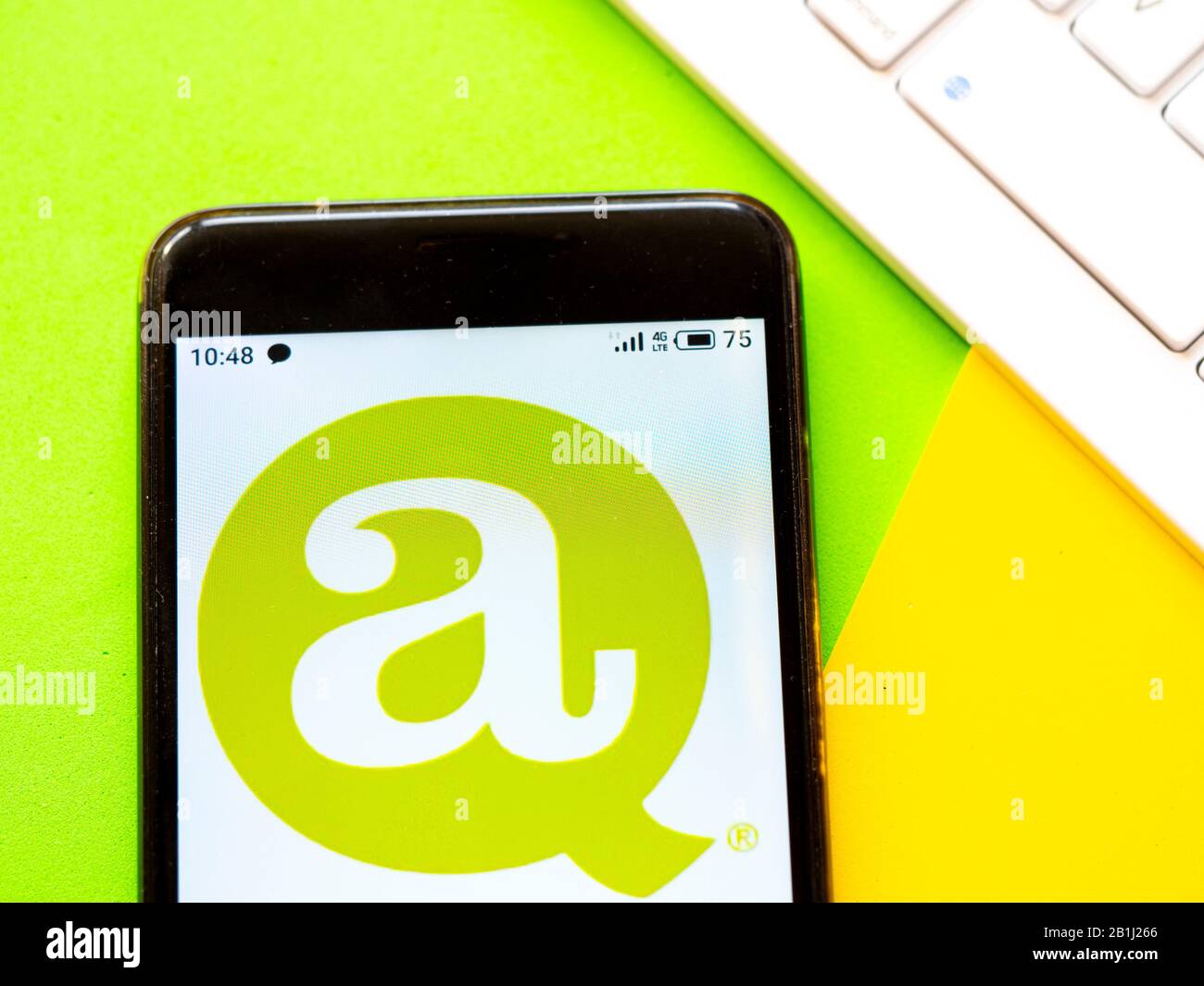 In this photo illustration the AccuQuilt logo is seen displayed on a ...