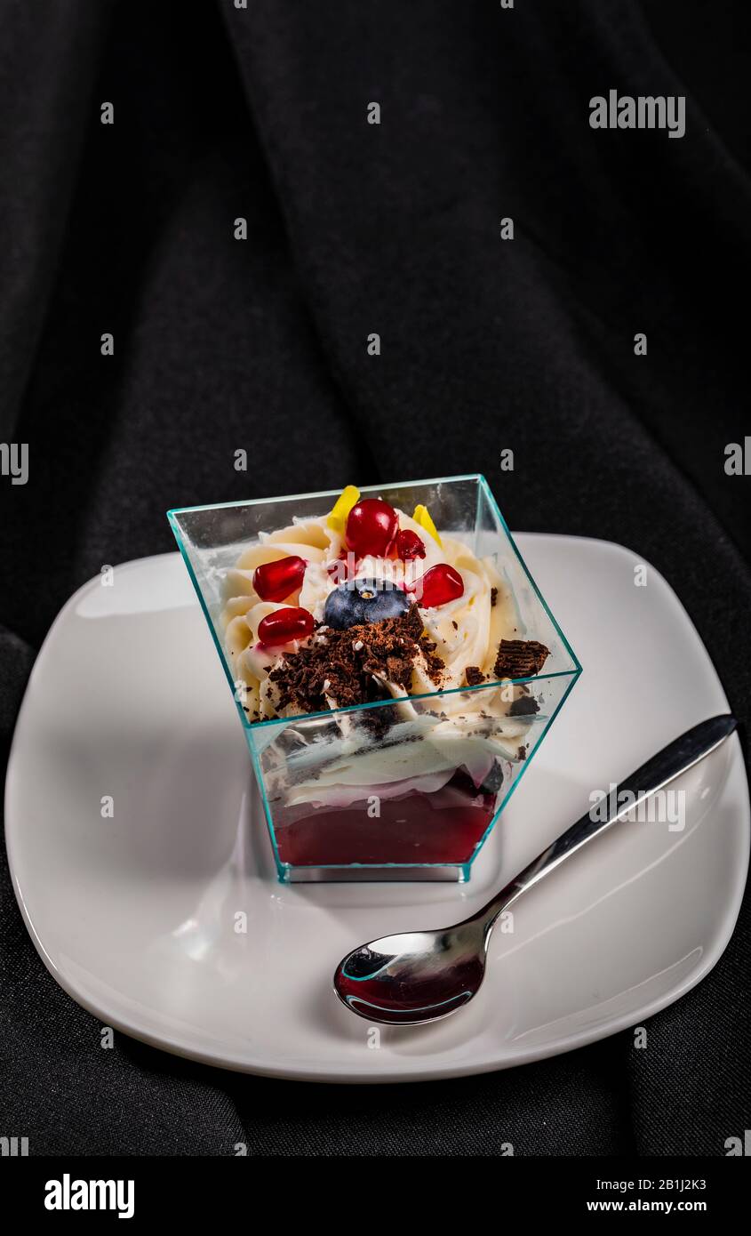 Individual portion of layered dessert Stock Photo - Alamy