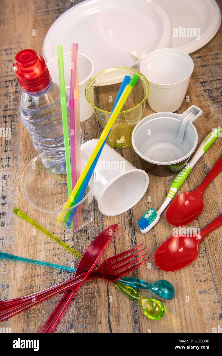Everyday plastic waste, various plastic utensils, environmental ...
