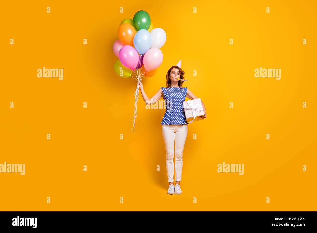 Full body photo of pretty lady hold colorful balloons big giftbox party ...