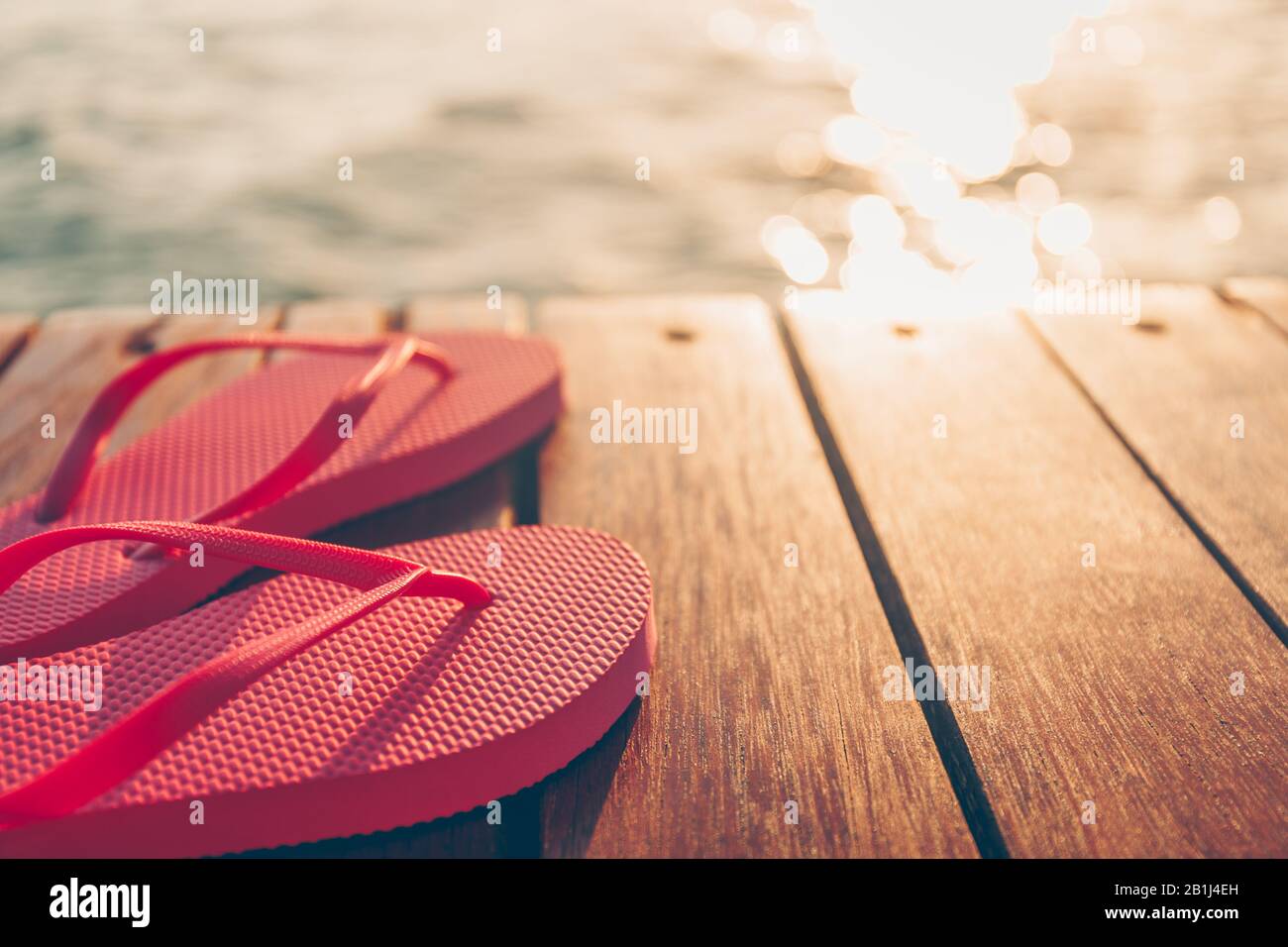 Golden flip flops hi-res stock photography and images - Alamy