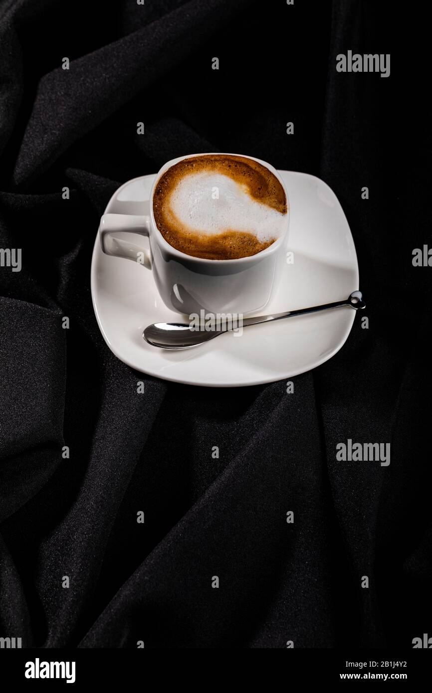 Coffee with milk, isolated Stock Photo - Alamy