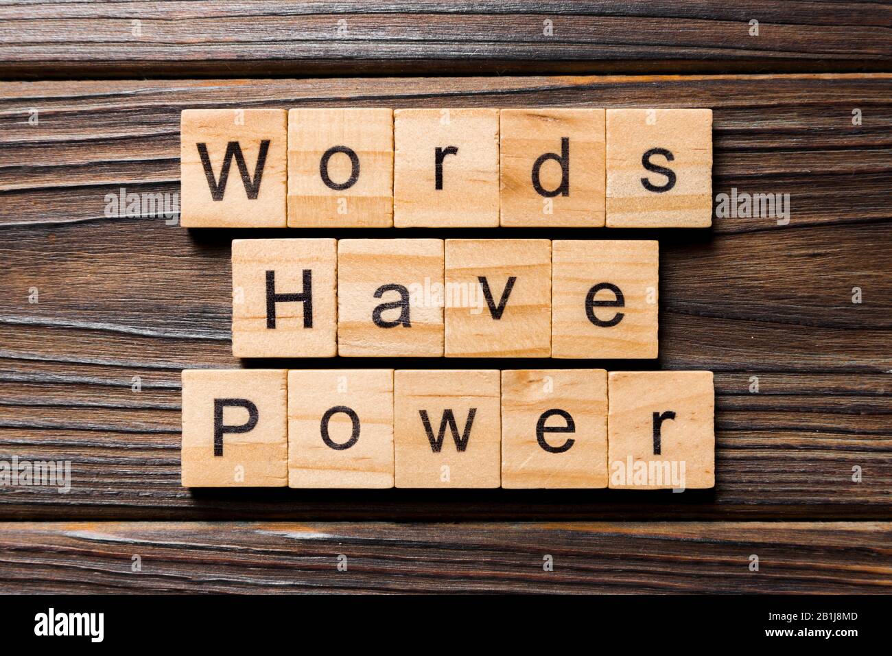 Words have Power word written on wood block. Words have Power text on ...