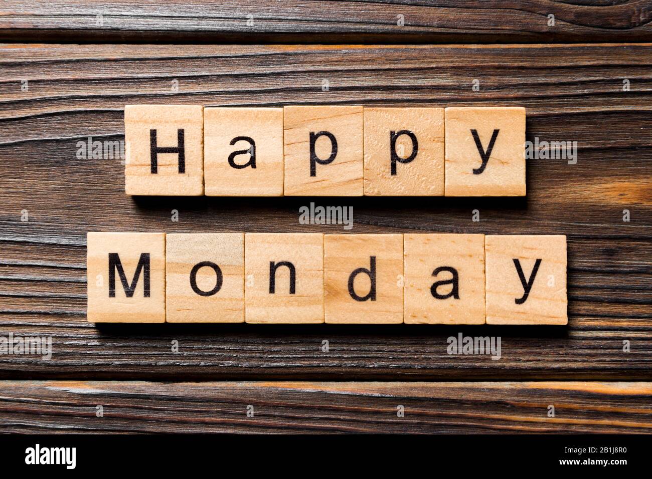 Happy monday word written on wood block. Happy monday text on wooden ...