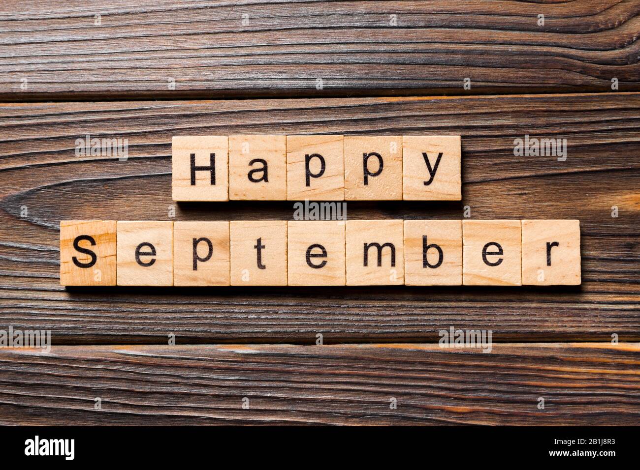 Happy september word written on wood block. Happy september text on ...