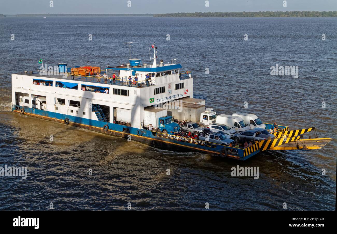 The Belem River Ferry passing by a Seismic Vessel anchored in the ...