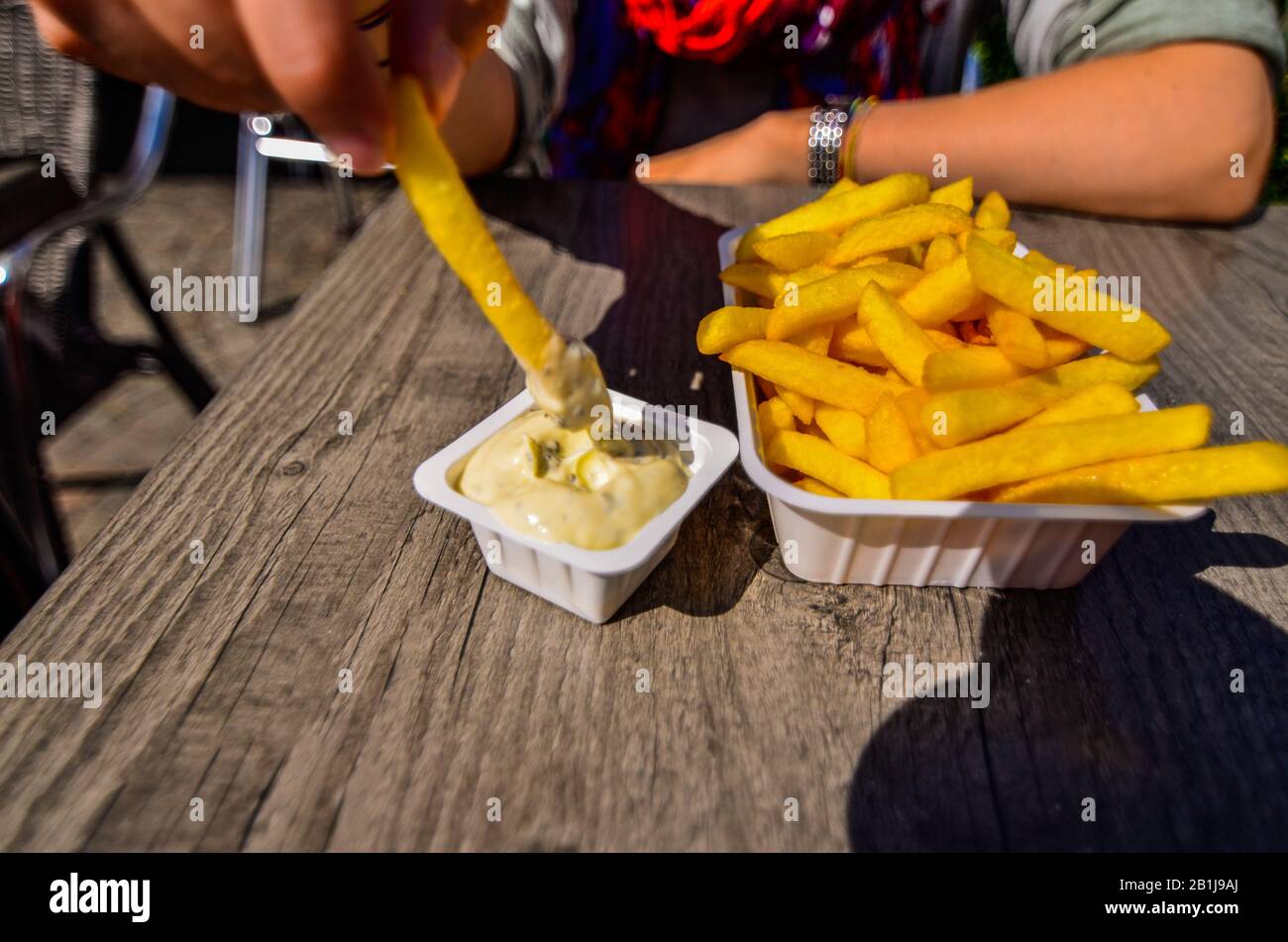 Bruges, Belgium, August 2019. A chip shop overlooking the touristy ...