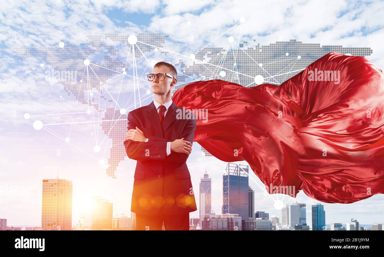 Concept of power and sucess with businessman superhero in big city ...