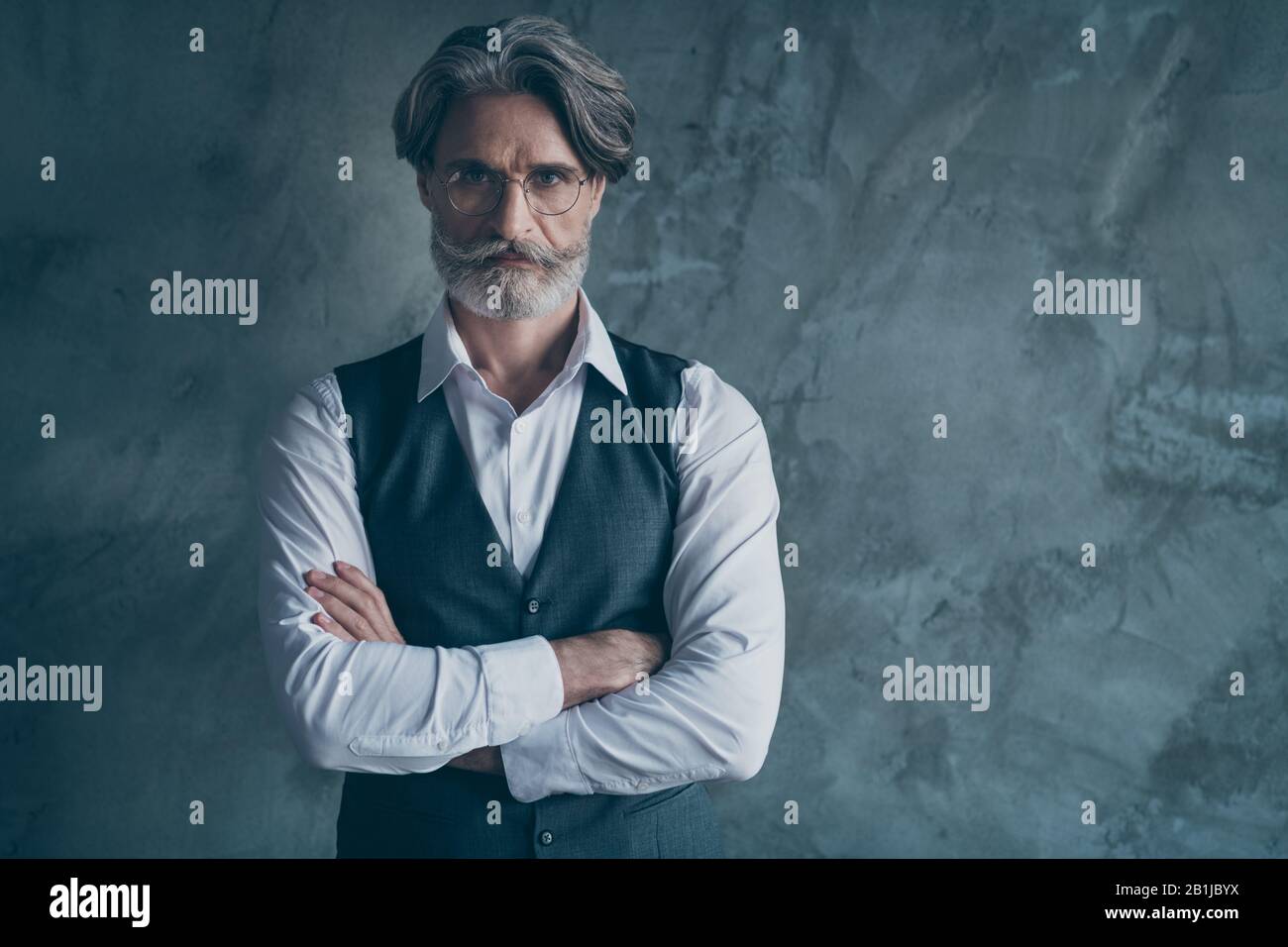 Portrait of strict old rich wealthy old man cross hands ready decide ...