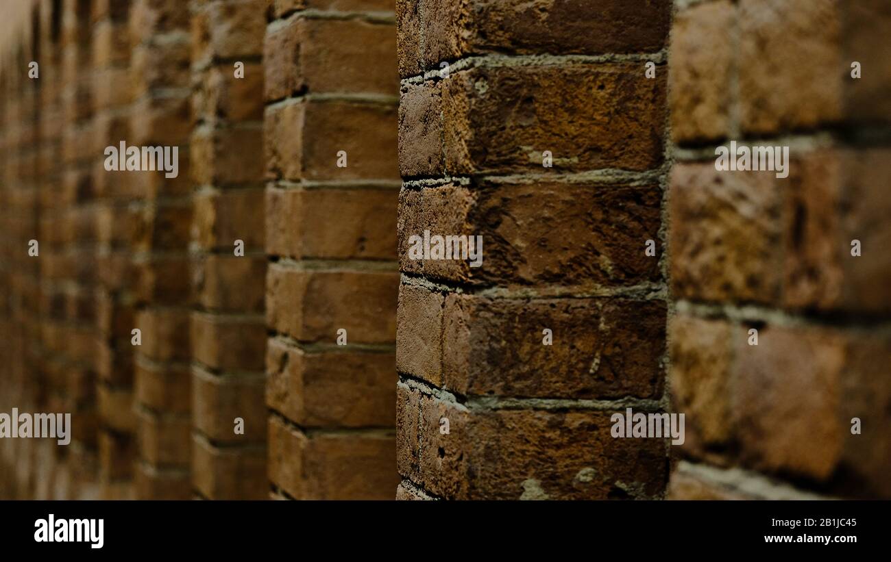 Brown brick wall side view Stock Photo - Alamy