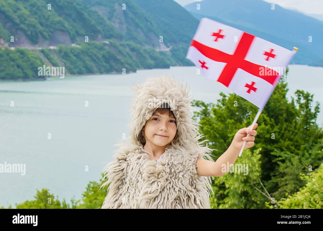A child in the Georgian costume. Selective focus Stock Photo - Alamy