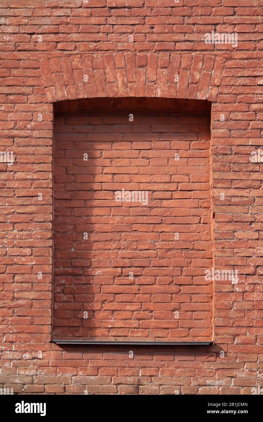 Red brick wall with closed windows. Architecture Stock Photo - Alamy