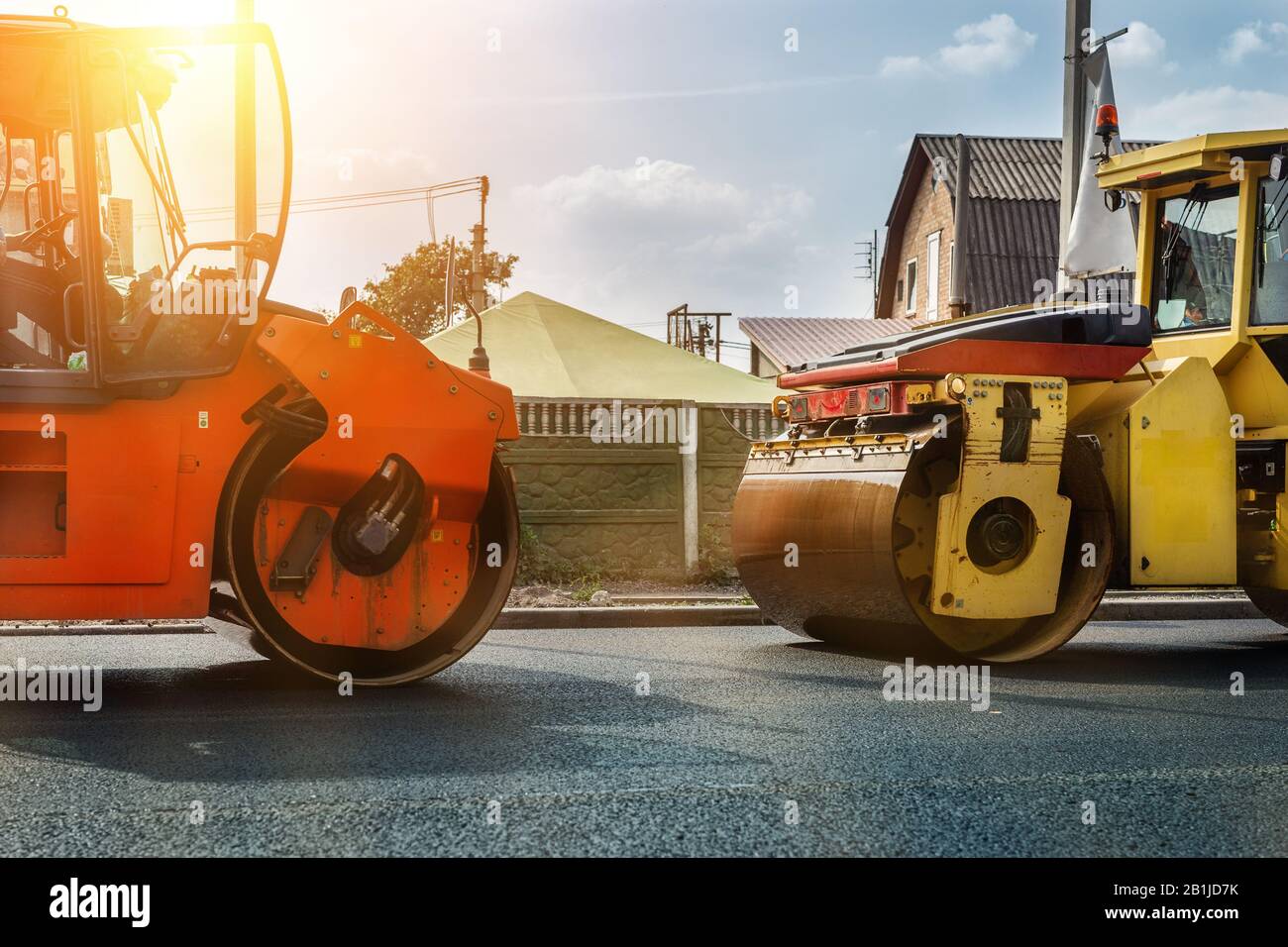 Asphalt higway road construction site. Heavy industrial machinery at ...