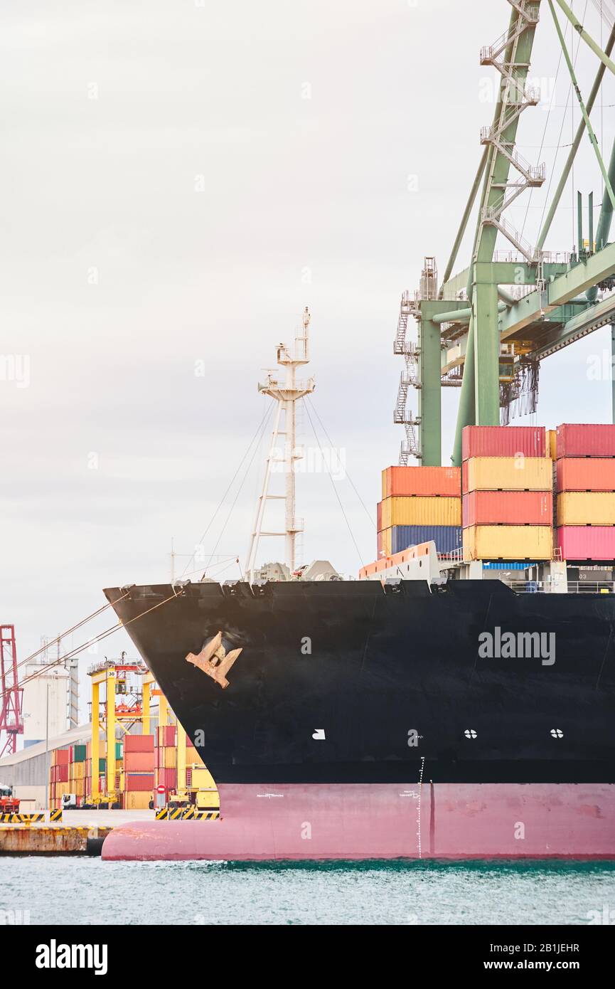 Containers ship in harbor enviroment. Transportation industry and ...