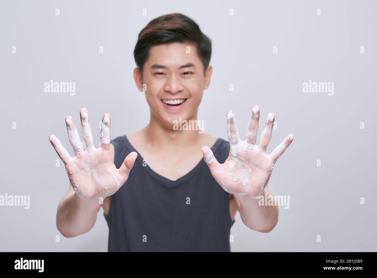 Man washing soapy hands Stock Photo - Alamy
