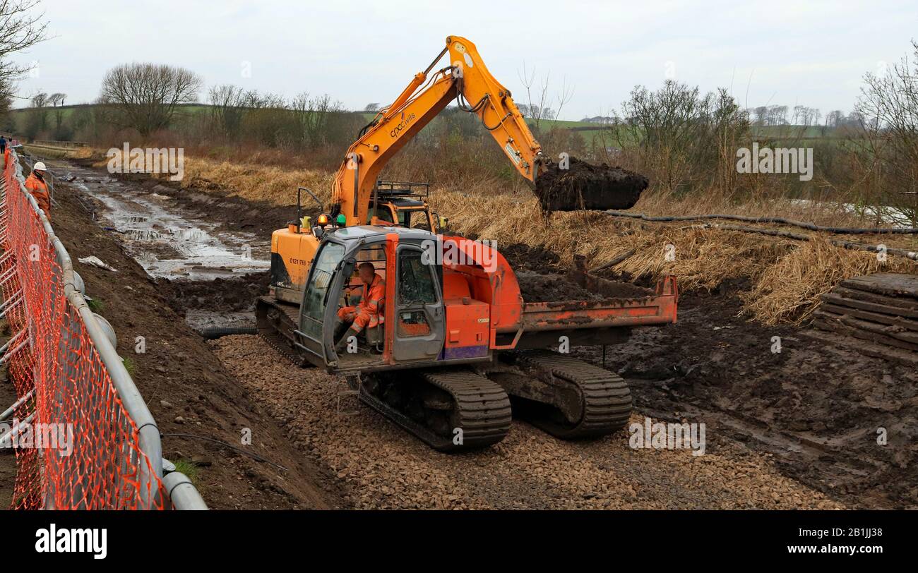 Silt is being removed from The Lancaster canal over the River Lune ...
