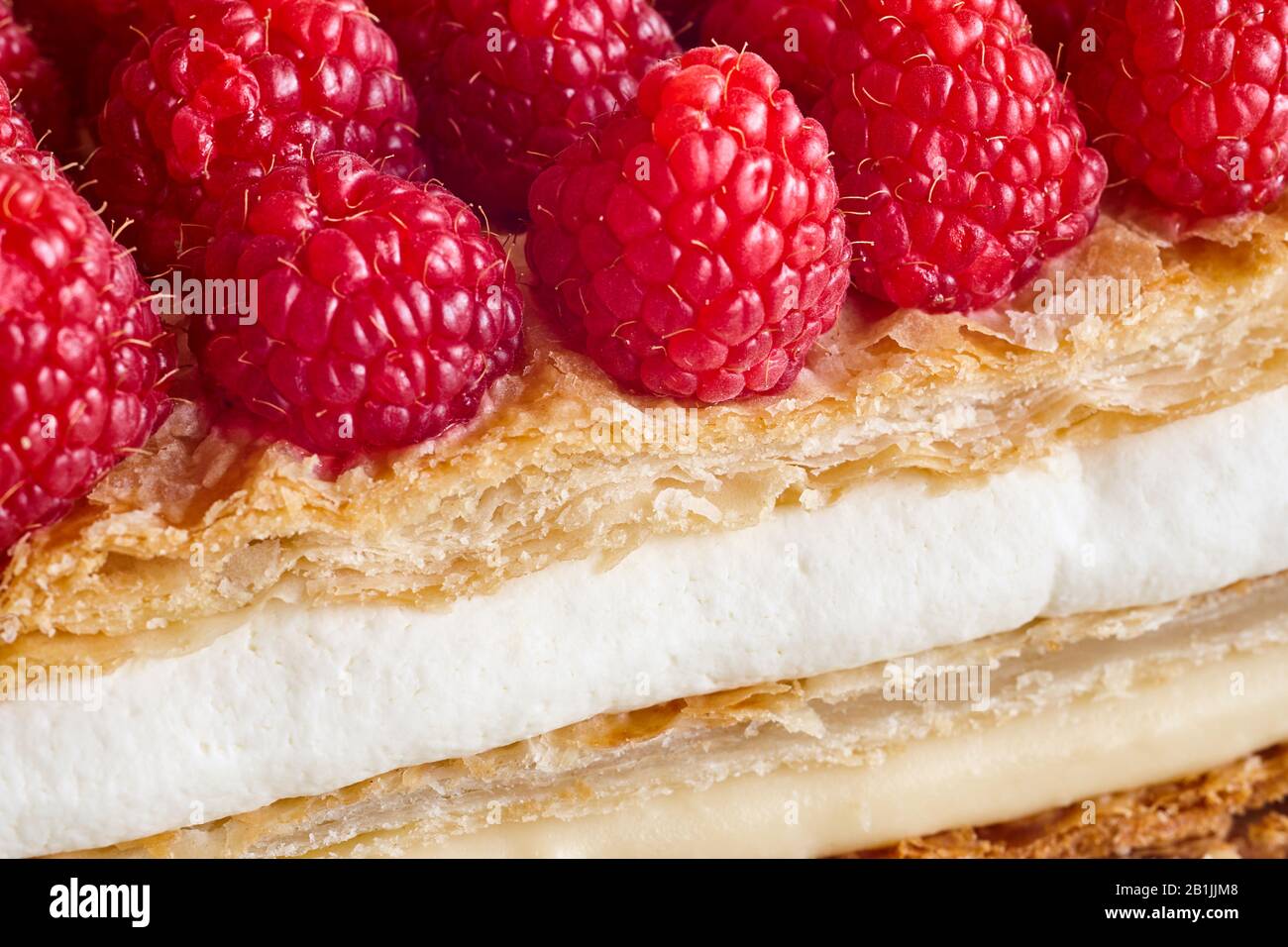 Delicious raspberry cake with puff pastry and cream. Homemade dessert ...