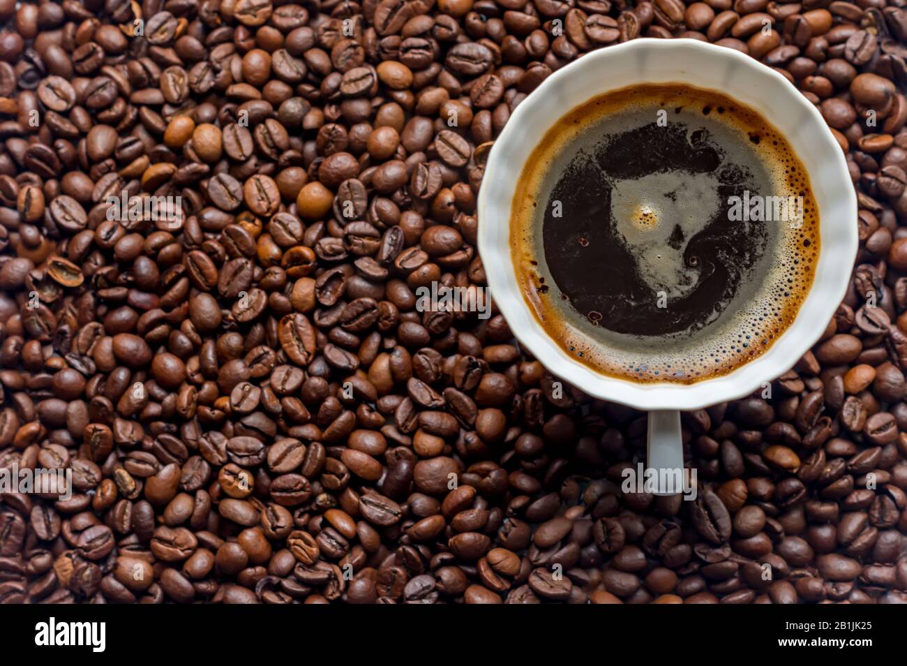 cup of coffe on coffe beans background Stock Photo - Alamy