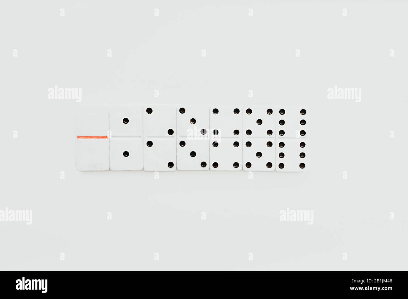 white dominoes on a white background are arranged in ascending order ...