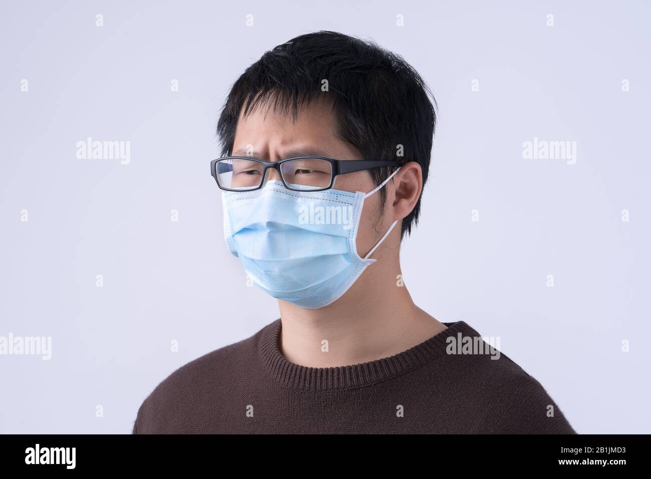 Young Asian man is coughing, feeling unwell, vomit sick with wearing a ...