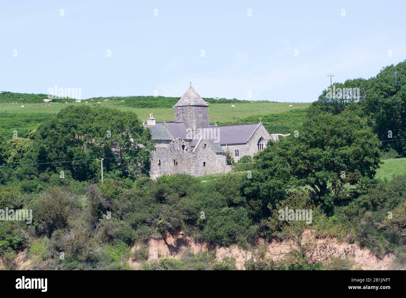 Landscape photograph of a building by the sea Stock Photo - Alamy
