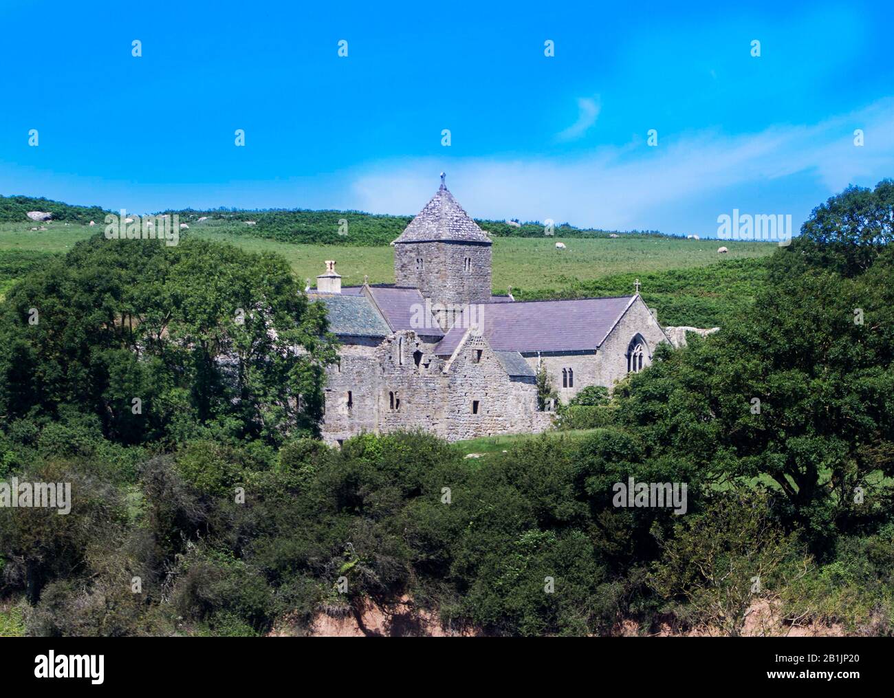 Landscape photograph of a building by the sea Stock Photo - Alamy
