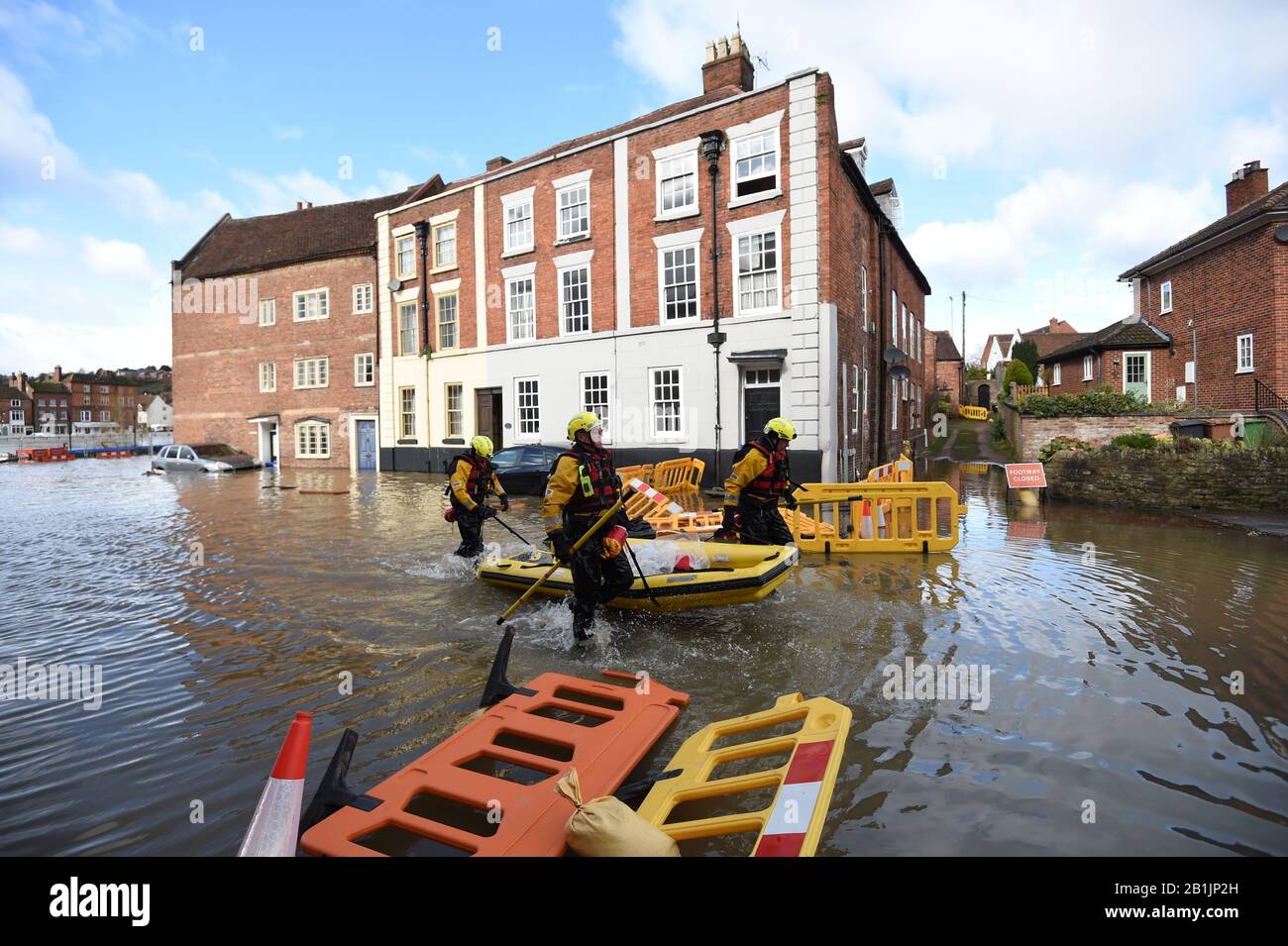 Fire and Rescue officers use an inflatable raft in Bewdley ...