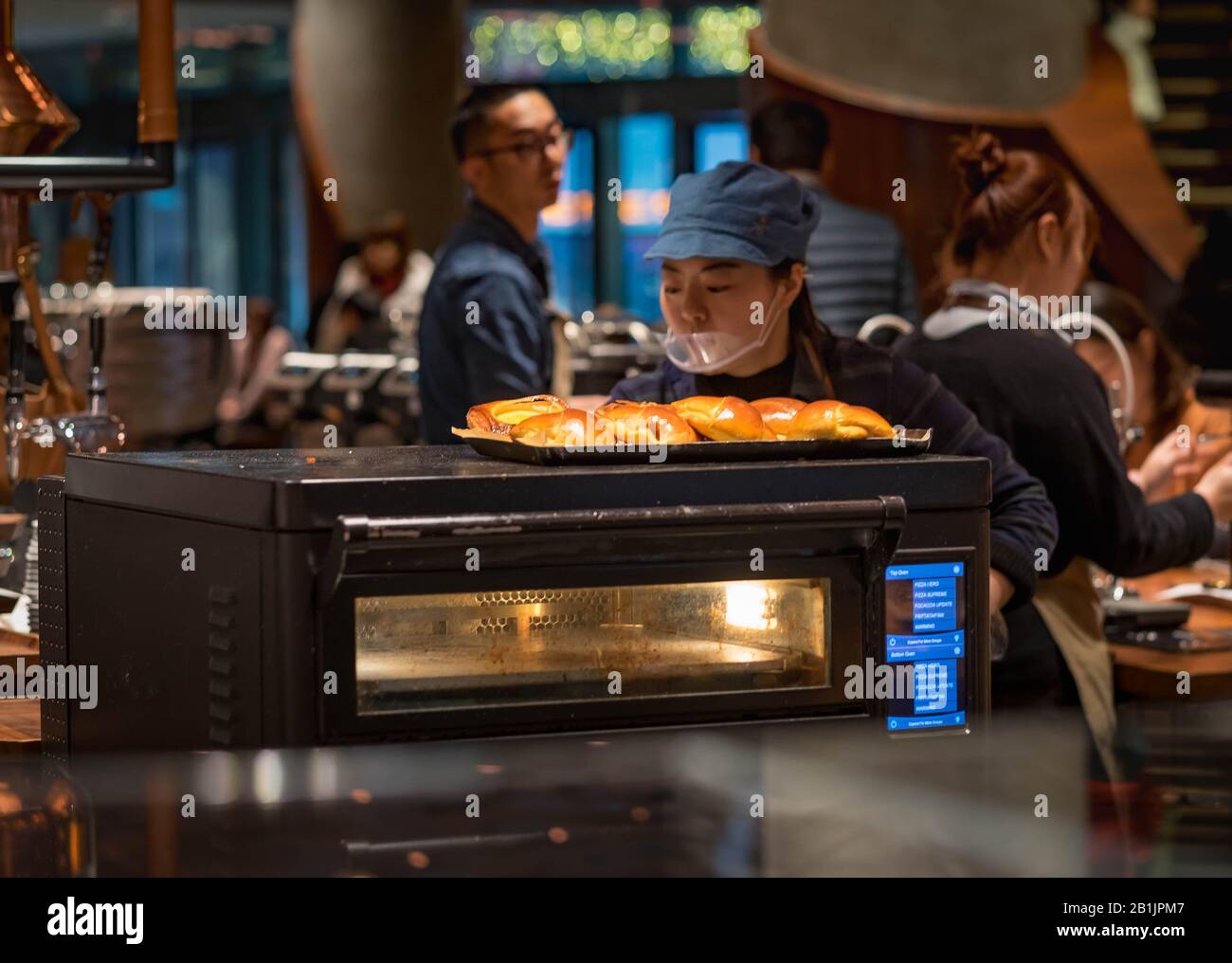 SHANGHAI, CHINA - JANUARY 11, 2020: A Starbucks bakery person’s that ...