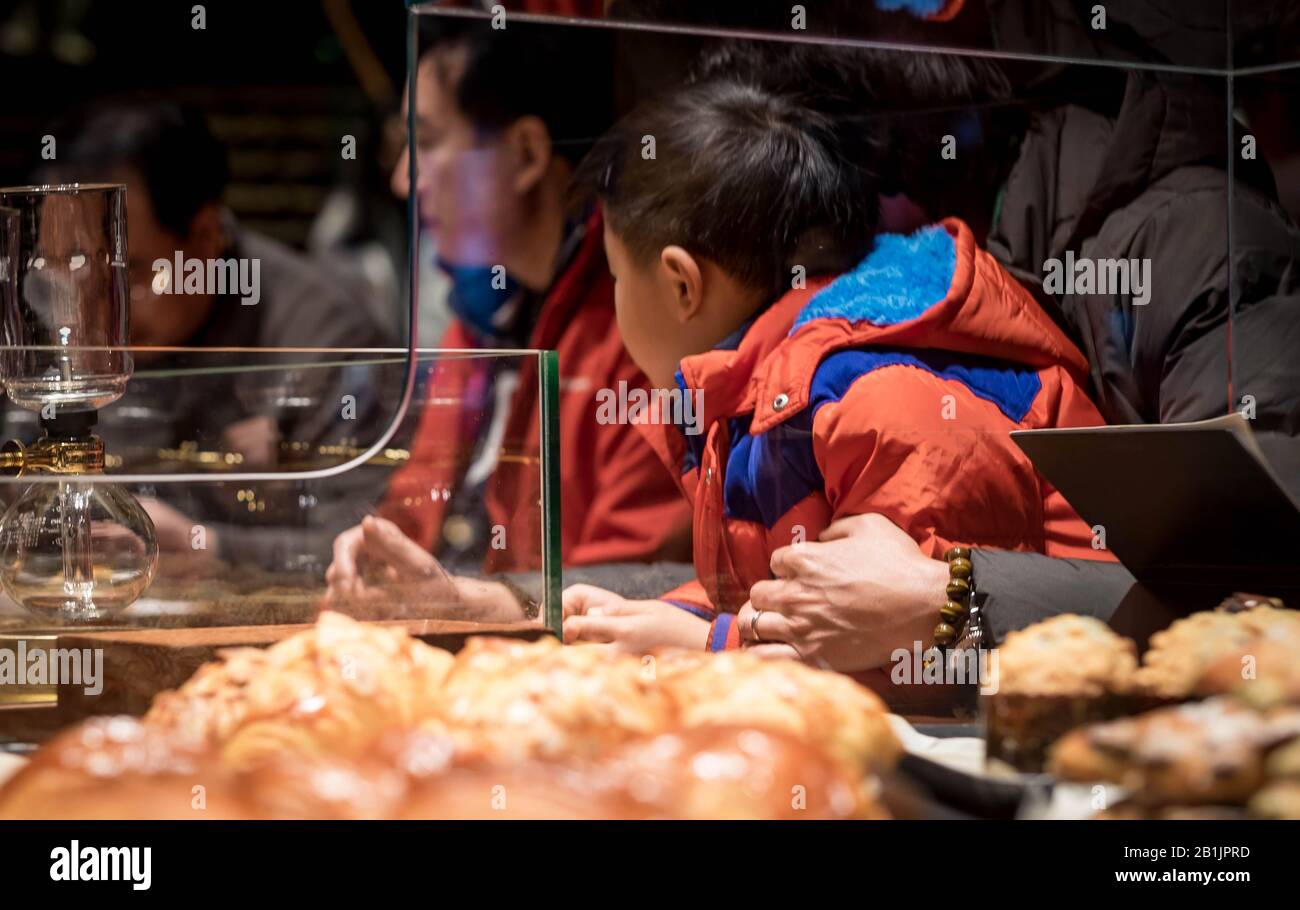 SHANGHAI, CHINA - JANUARY 11, 2020: A Starbucks bakery person’s that ...