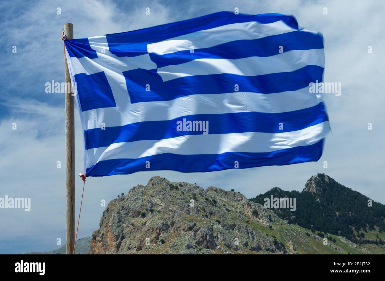 Waving greek flag cross silhouette hi-res stock photography and images ...