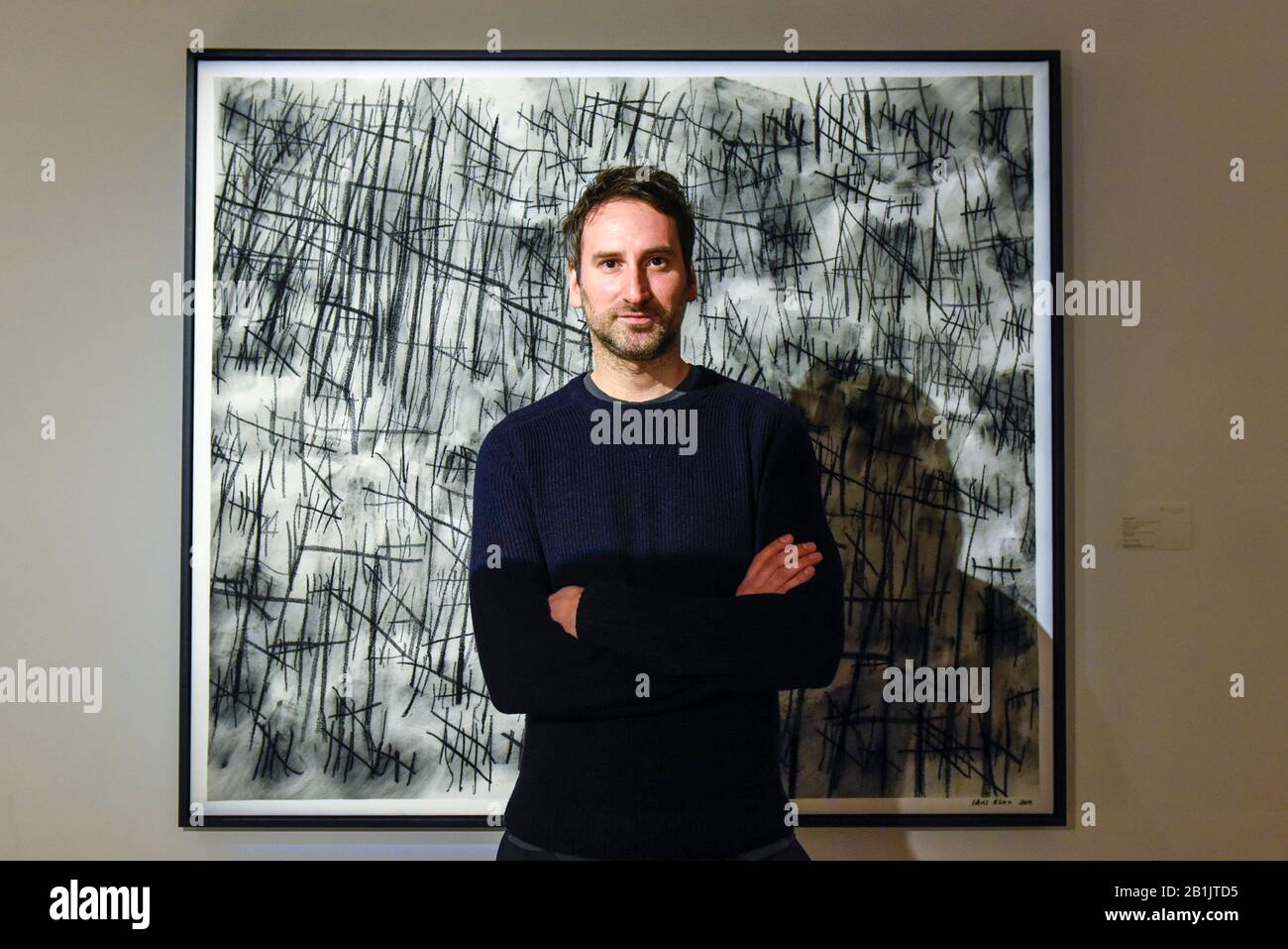 London, UK. 26 February 2020. Artist Idris Khan poses with his work ...
