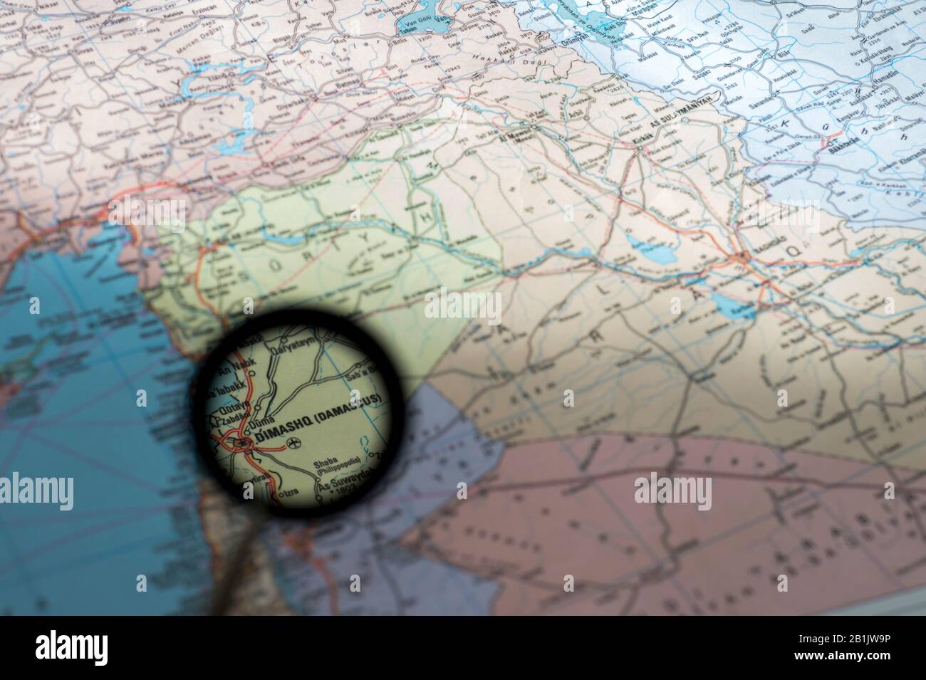 The capital of Syria, Damascus, through a magnifying glass on the ...