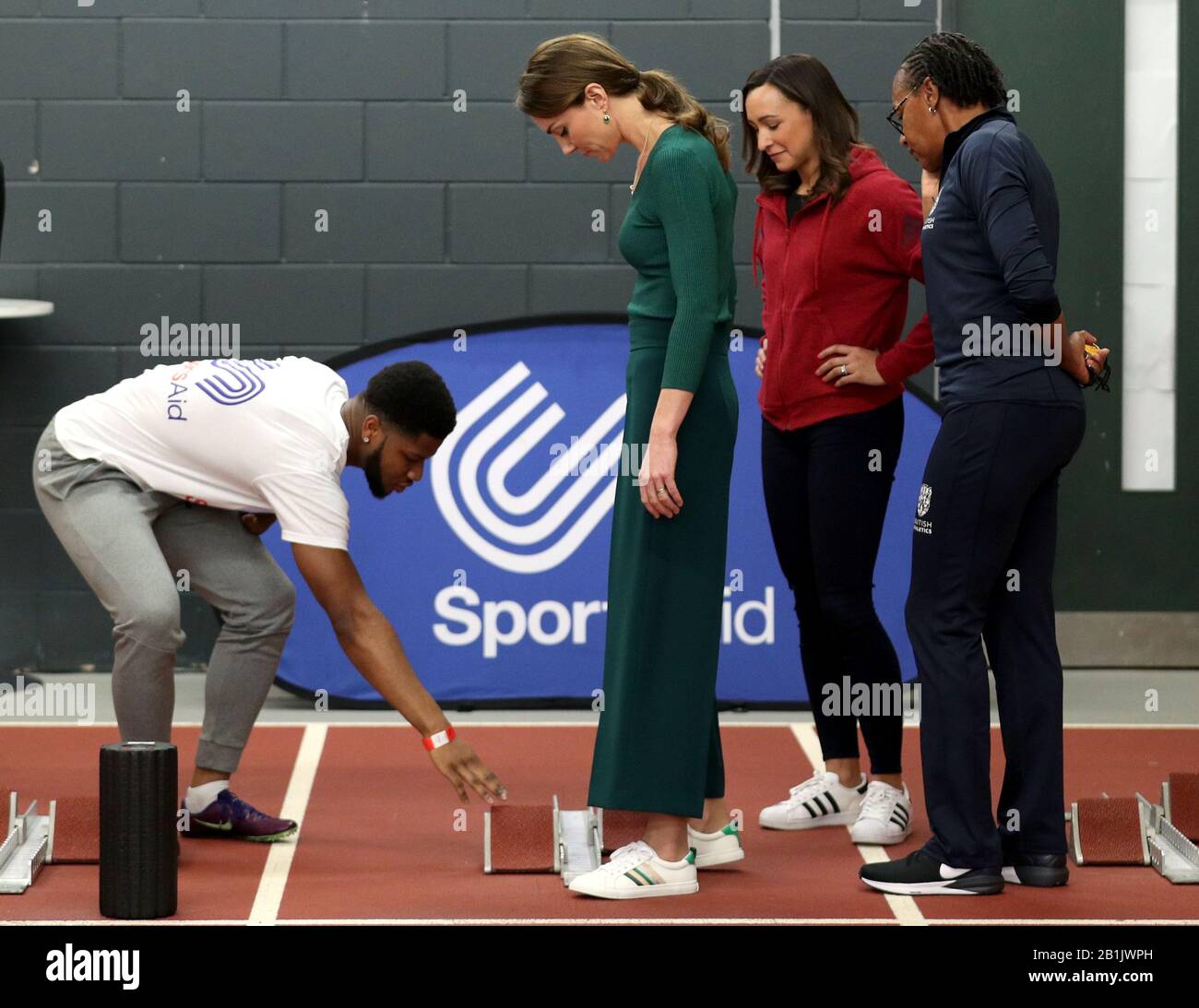 Heptathlete Jessica Ennis-Hill (second right) watches as para-athlete ...
