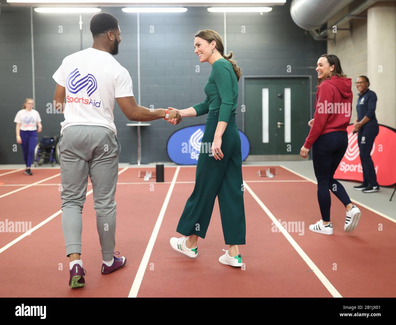 Heptathlete Jessica Ennis-Hill (second right) watches as para-athlete ...