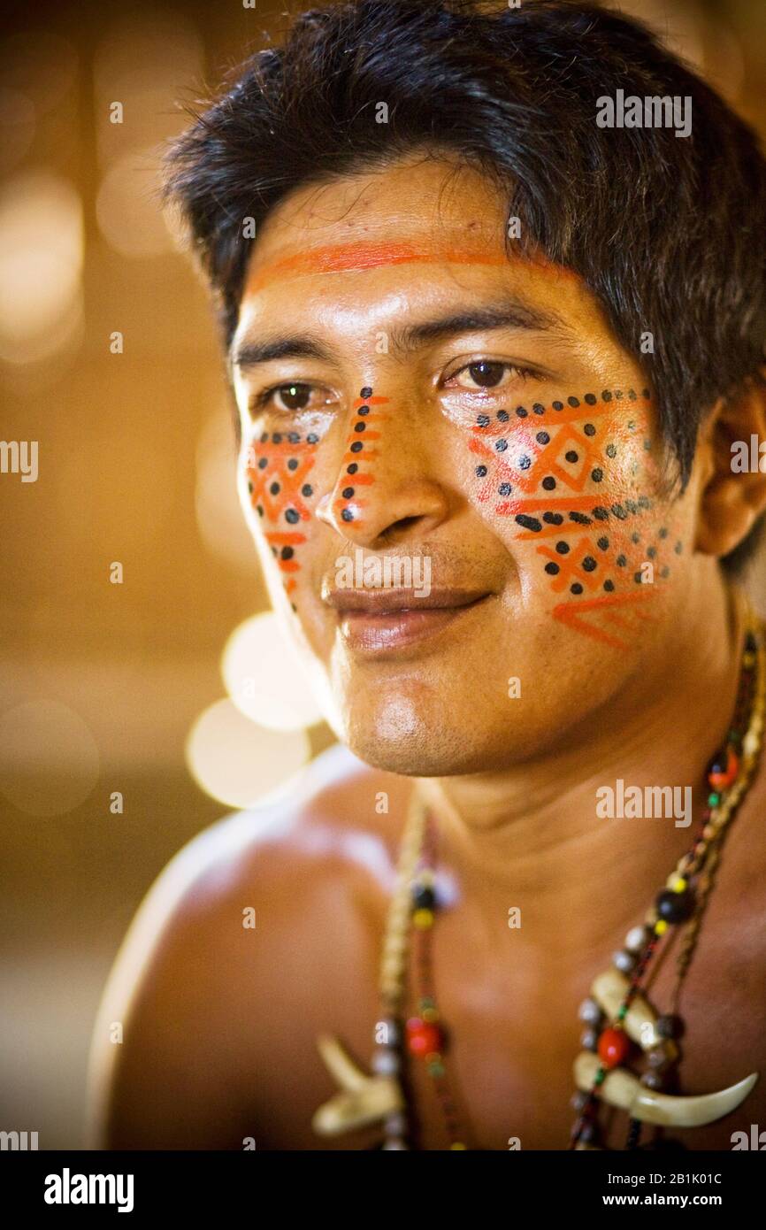 Brazil indigenous people face painting hi-res stock photography and ...