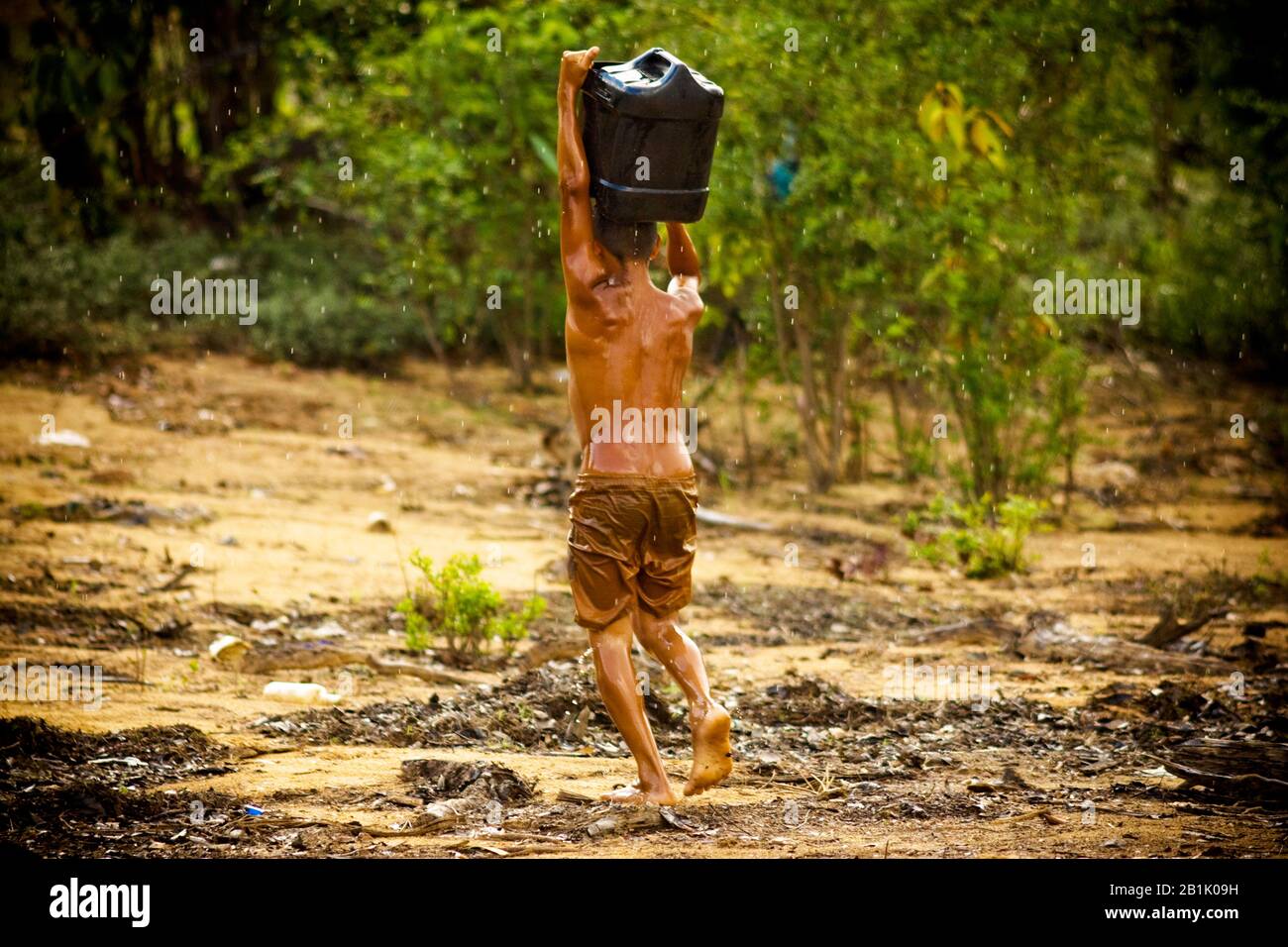 Boy Carrying Bucket in the Head, Castanha Community, Negro River, Novo ...