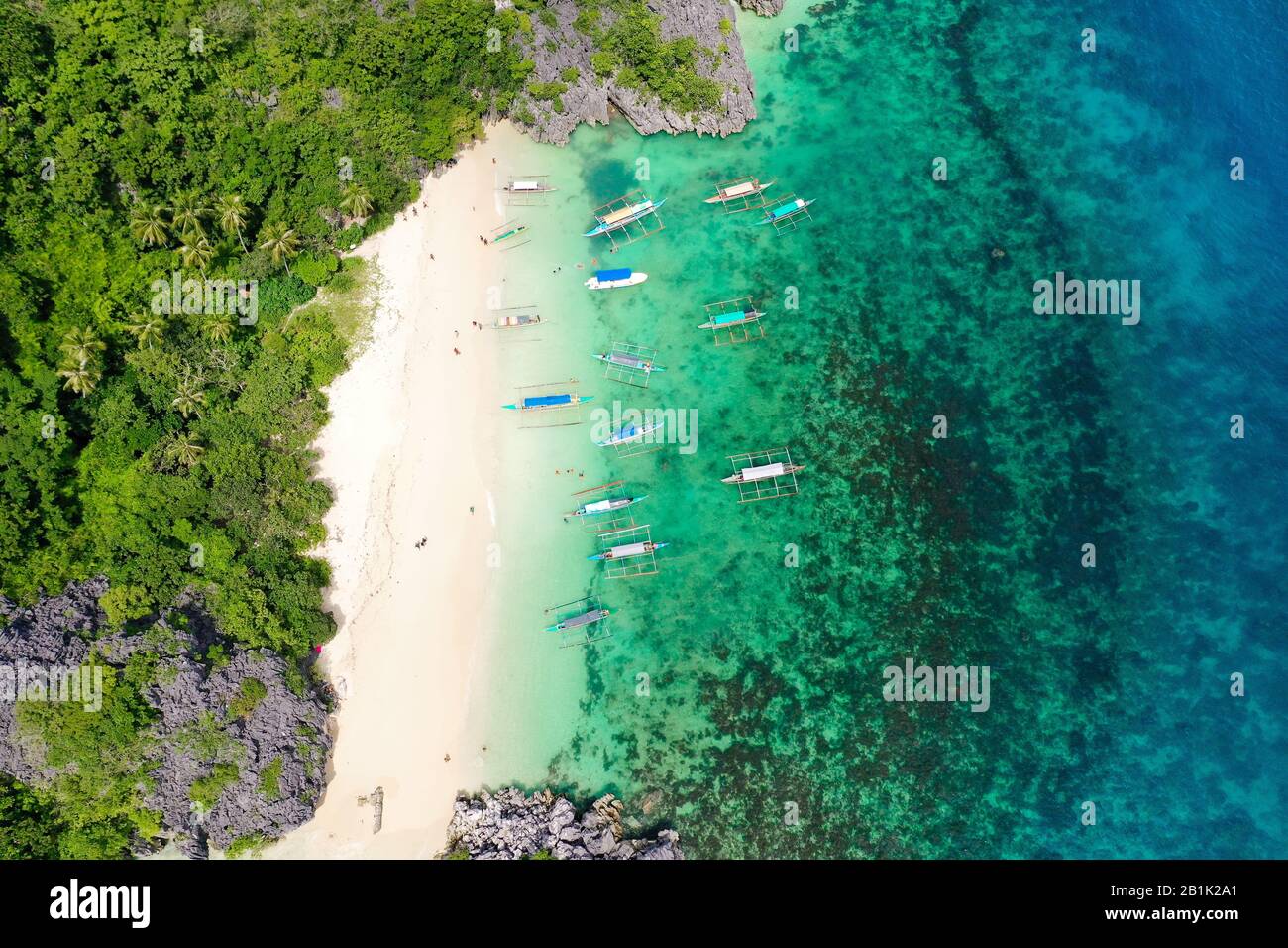 Tropical landscape: Matukad Island with beautiful beach and tourists by ...