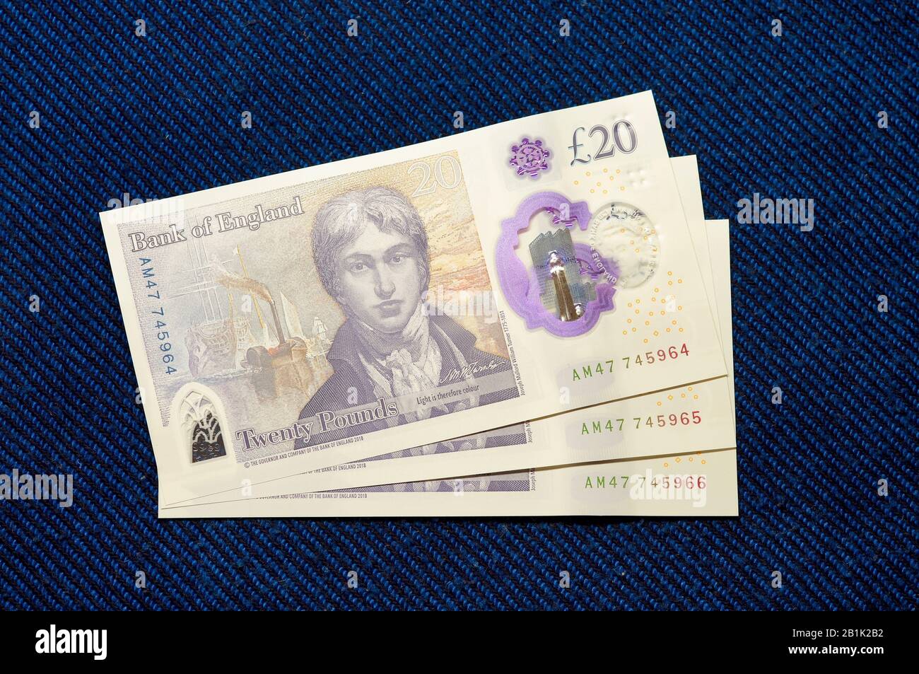 Polymer £20 banknote with sequential serial numbers Stock Photo - Alamy