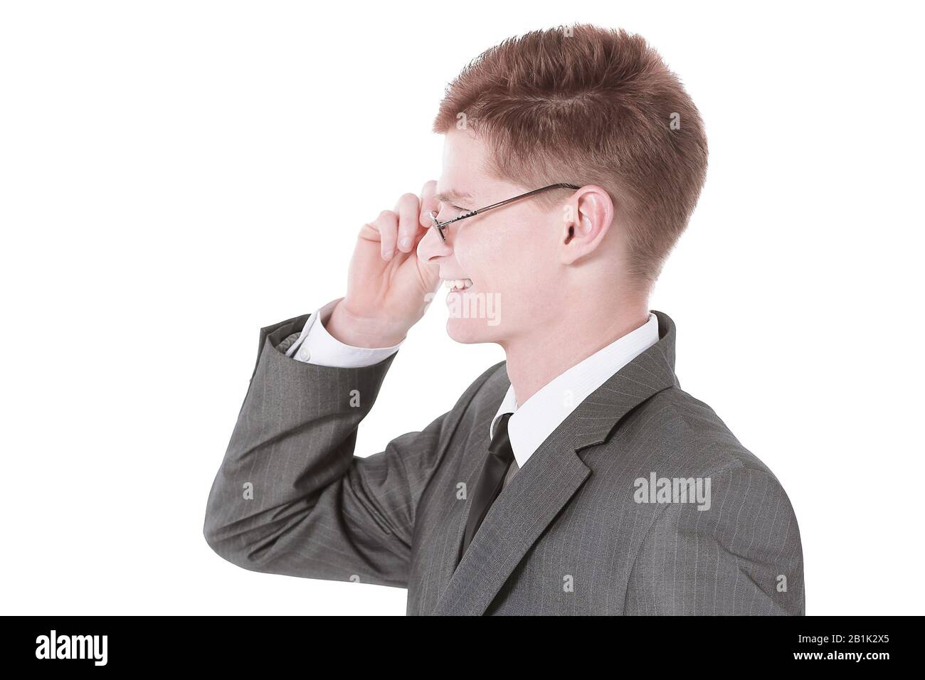 side view. successful young businessman.isolated on a white Stock Photo ...