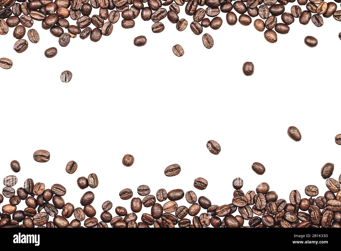 Scattered black coffee beans on top and bottom isolated on a white ...