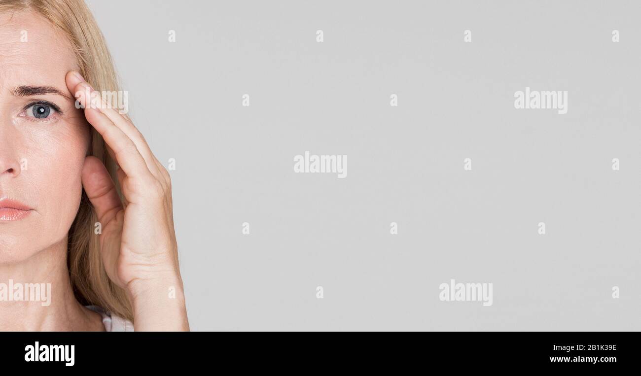 Sad middle aged woman thinking about problems Stock Photo - Alamy