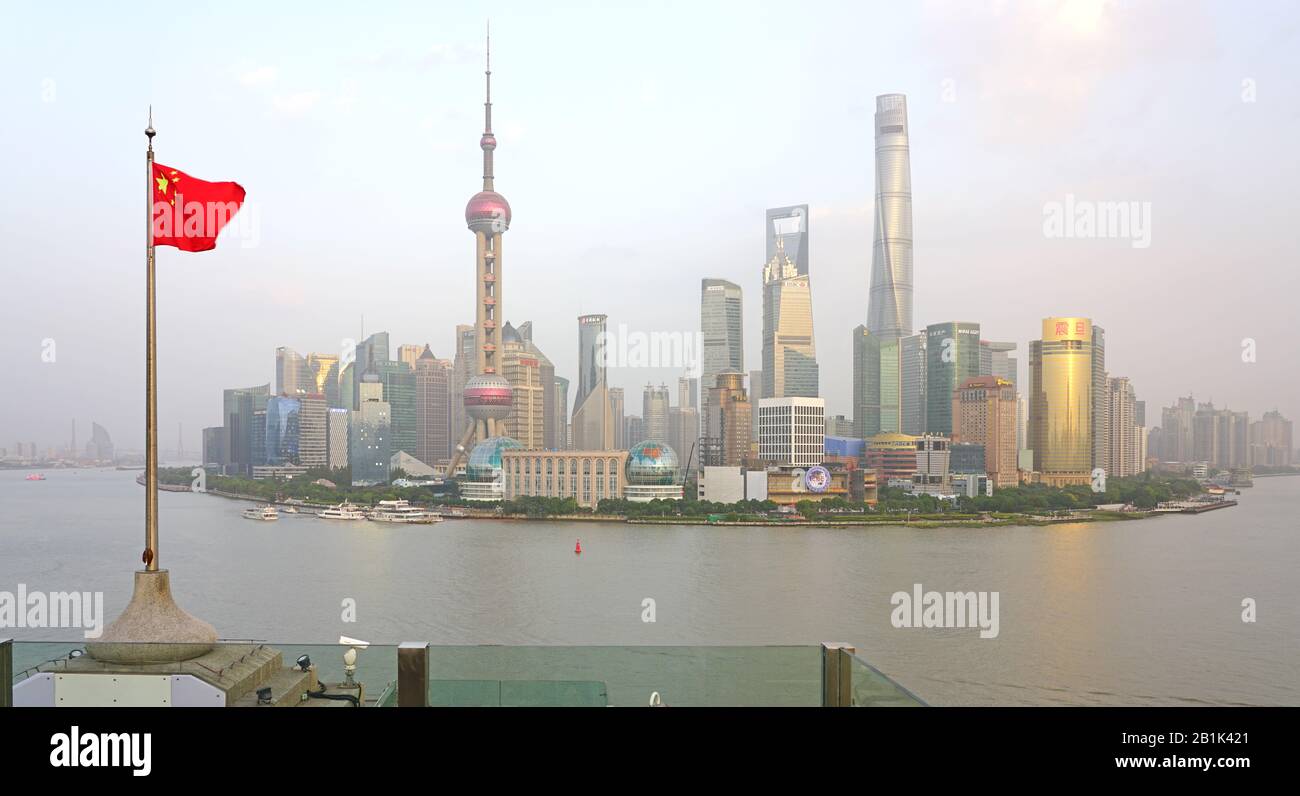 SHANGHAI, CHINA -29 OCT 2019- A Chinese flag floating in front of a ...